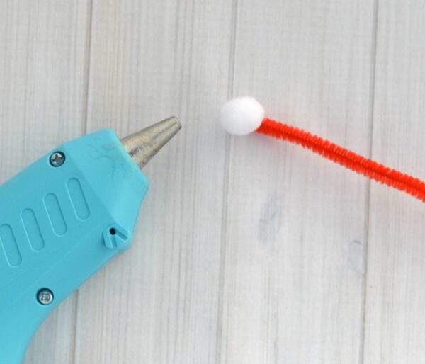 Craft Stick Penguin Ornament - The Resourceful Mama